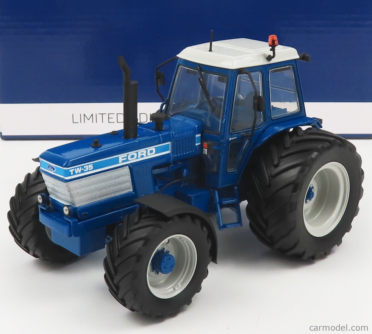 UNIVERSAL HOBBIES UH6431 Scale 1/32 | FORD USA TW-35 TRACTOR 1992 BLUE GREY